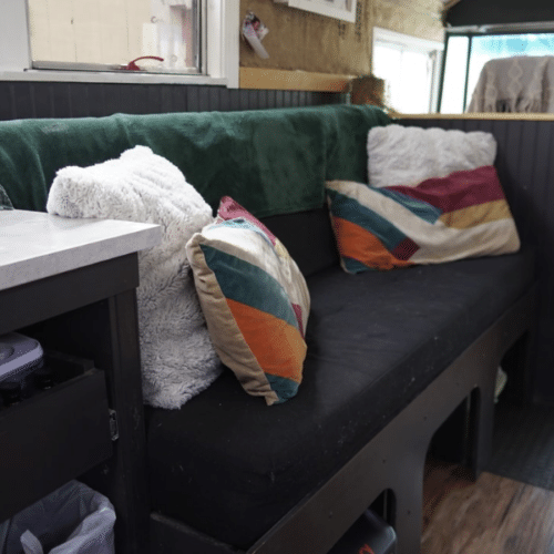 16 Skoolie Couch Ideas + Build Tips (Placement, Design, & Dimensions)
